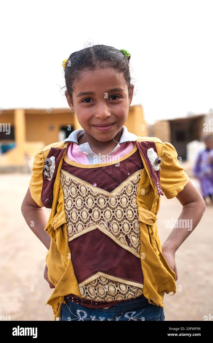 Portrait of a pretty young girl in a village near Siwa Oases. The Siwa ...