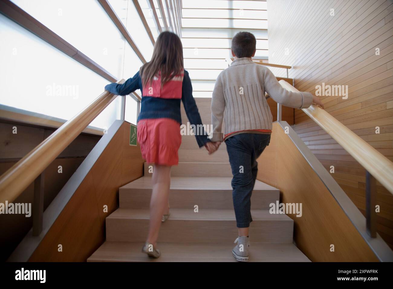 Child going up stairs hi-res stock photography and images - Alamy