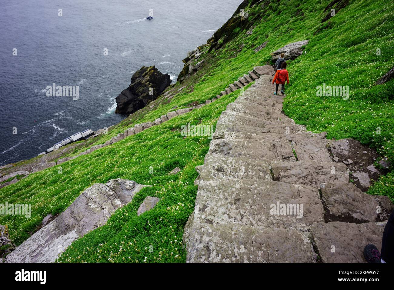 visitors on the steep path up to the monastery, Skellig Michael island ...