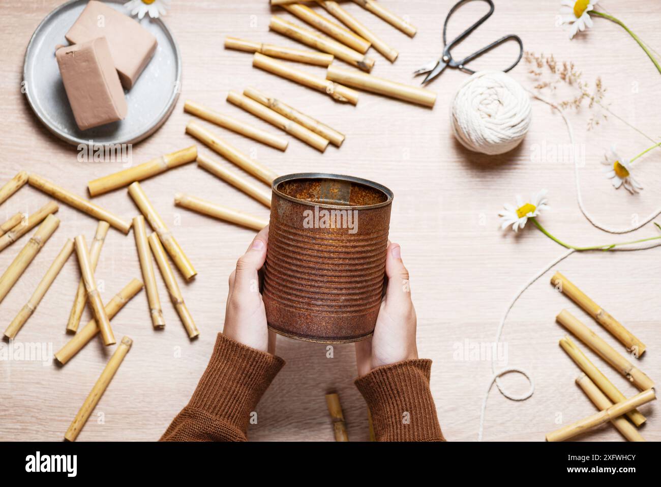 Step. 1 Take a well cleaned tin can and prepare equally cut bamboo ...