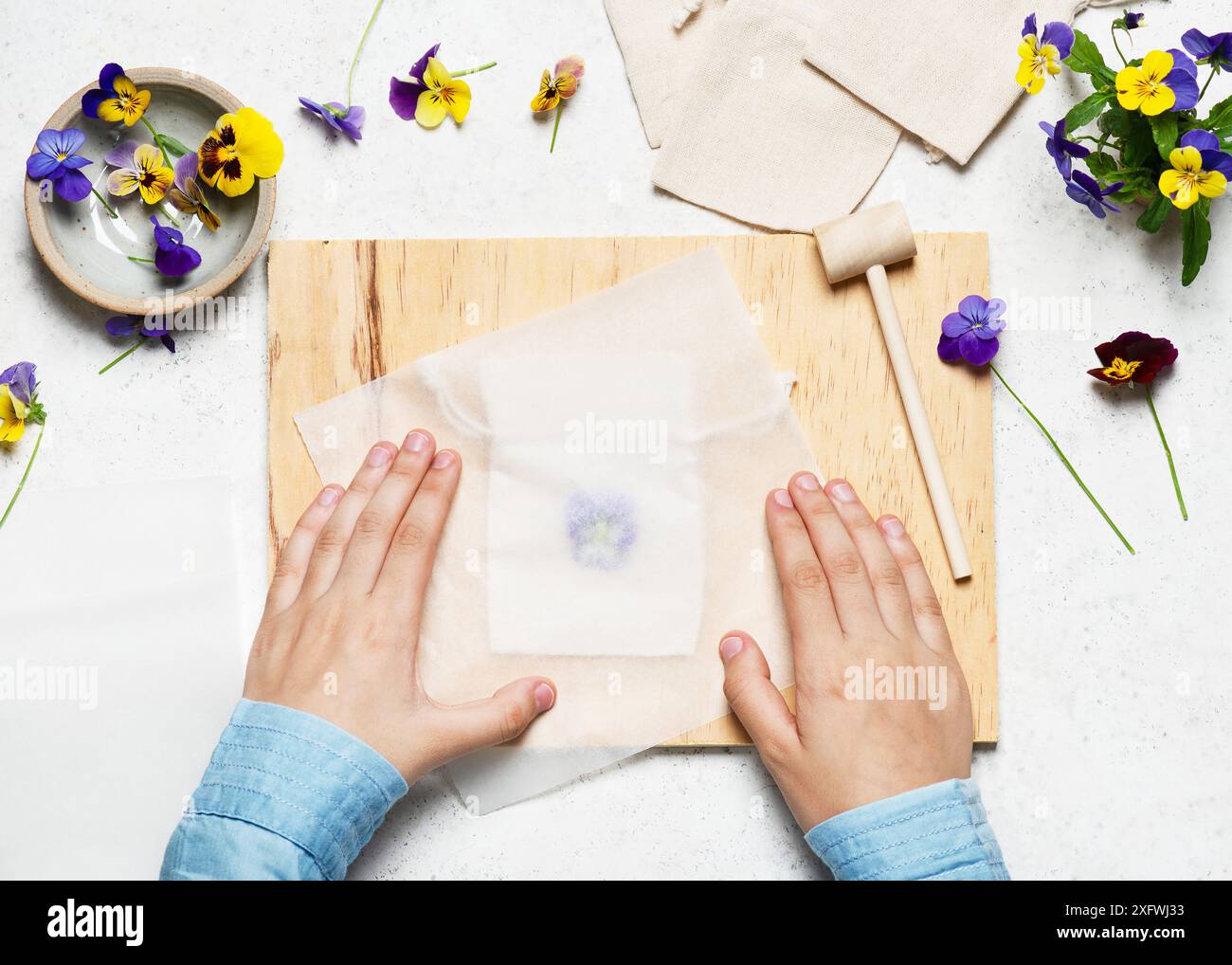 Step 2. Cover the flowers with a transparent paper. Hammered flower ...