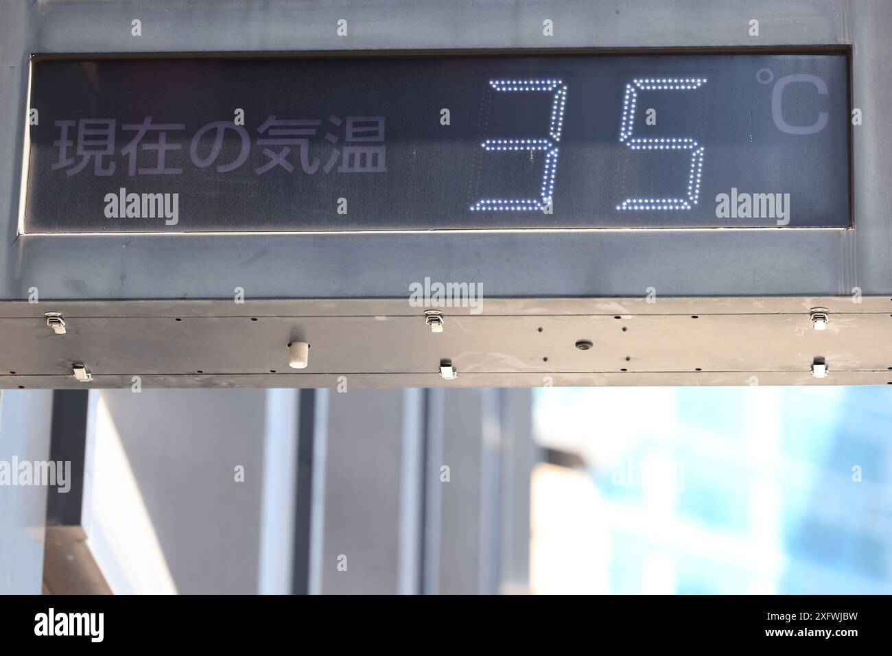Tokyo, Japan. 5th July, 2024. A thermometer on the street displays a ...