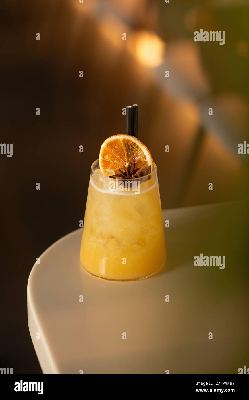 Summer drink cocktail. Orange cinnamon iced drink Stock Photo - Alamy