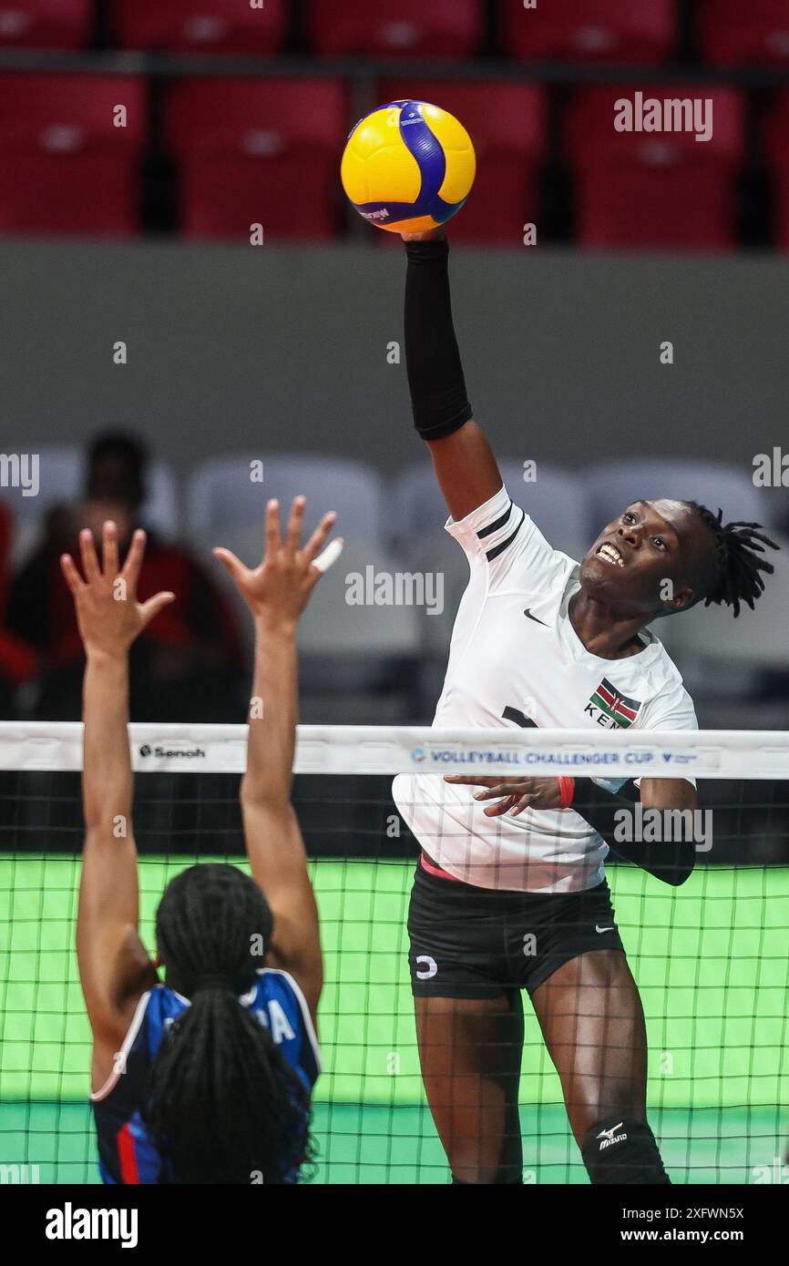 Manila, Philippines. 4th July, 2024. Pamella Adhiambo Owino (R) of ...