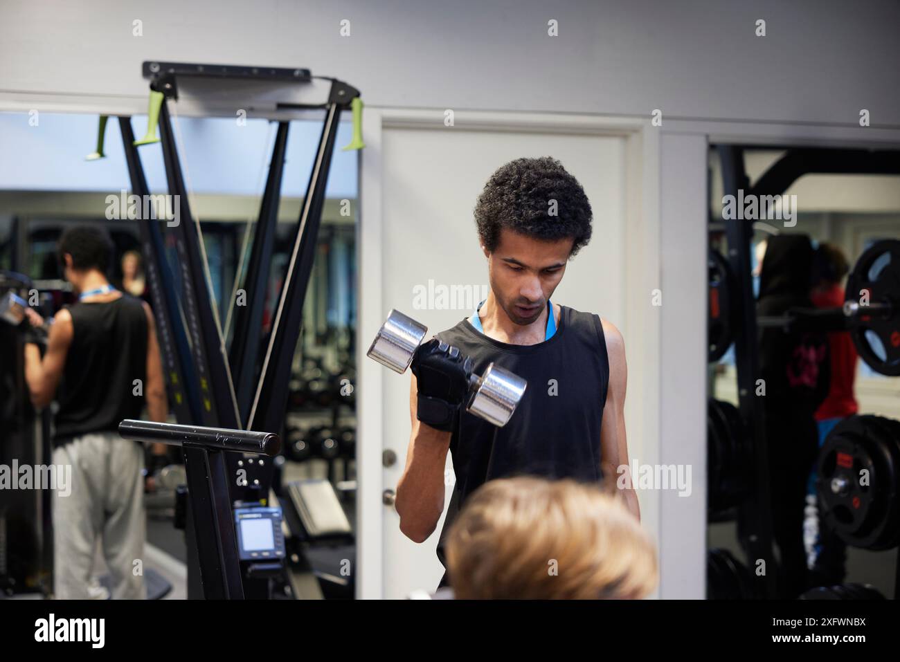 Dumbbell pull hi-res stock photography and images - Alamy