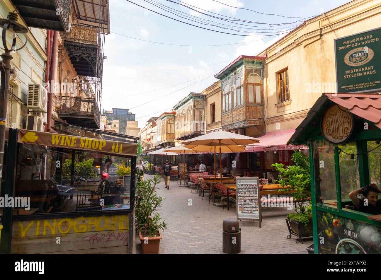 Tbilisi, Georgia - 17 JUNE, 2024: Vibrant street with bars, cafes and ...