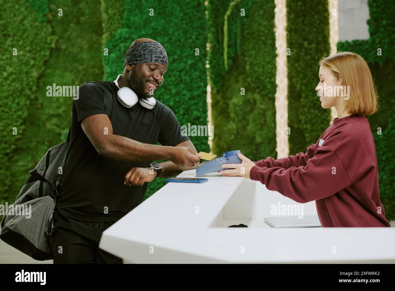African american man tapping fitness hi-res stock photography and ...