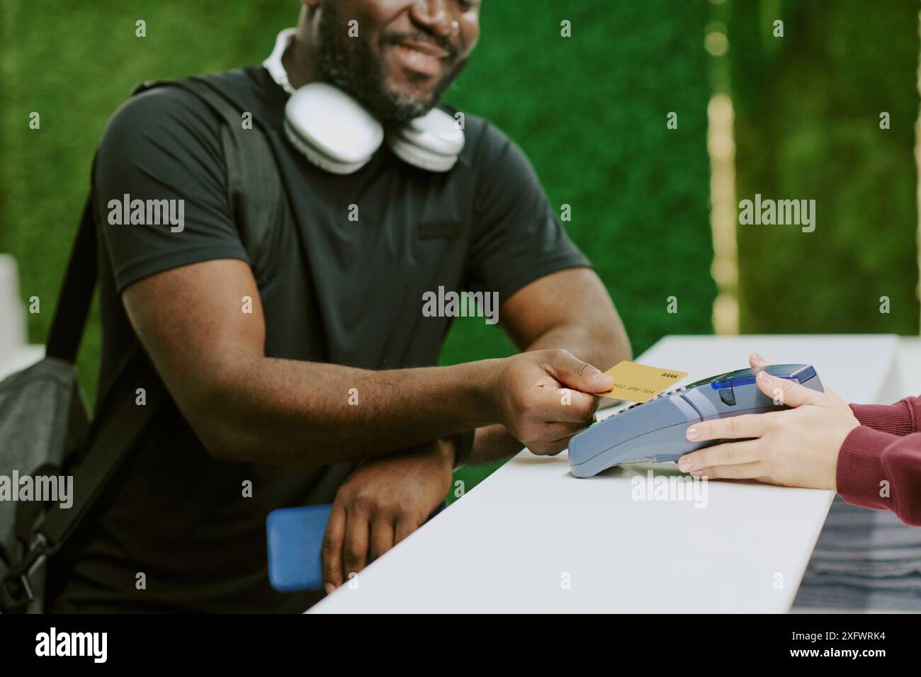 African american man tapping fitness hi-res stock photography and ...