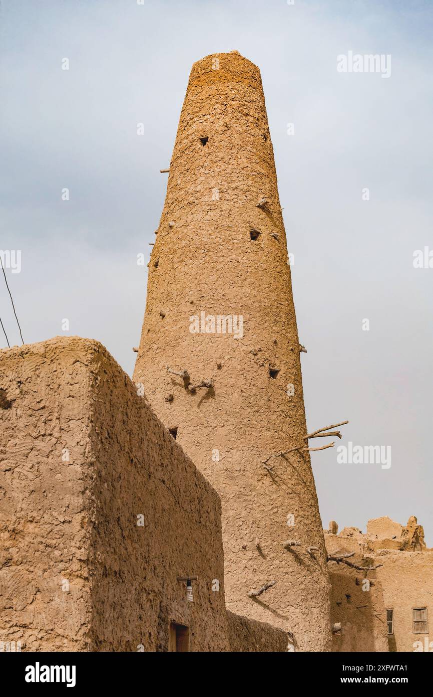 A traditional mud brick tower in the ruined fortress city of Shali ...