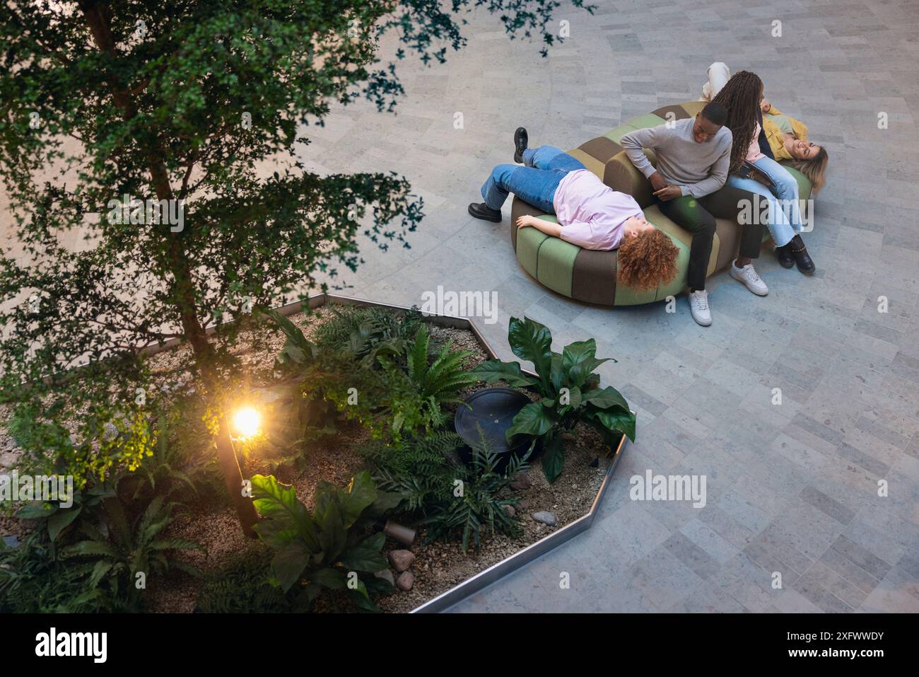 Lady relaxing on couch listening hi-res stock photography and images ...