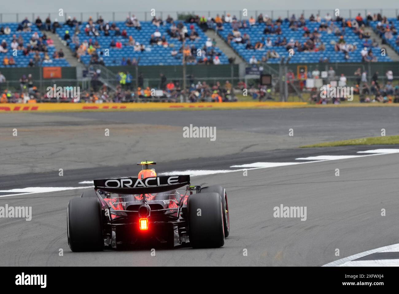 Red Bull driver Sergio Perez of Mexico steers his car during the first free practice at the ...
