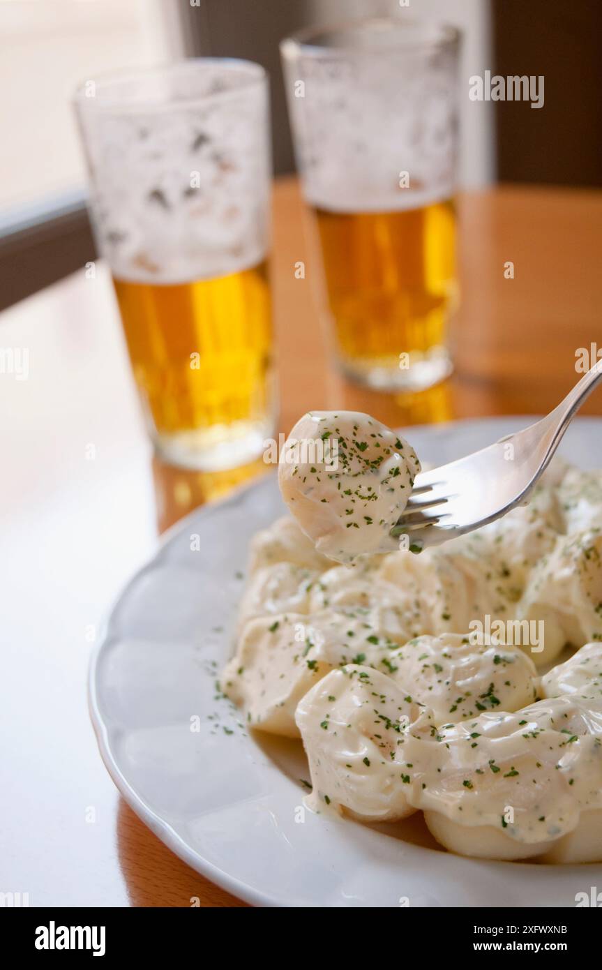 Potatoes with alioli sauce. Spain Stock Photo - Alamy