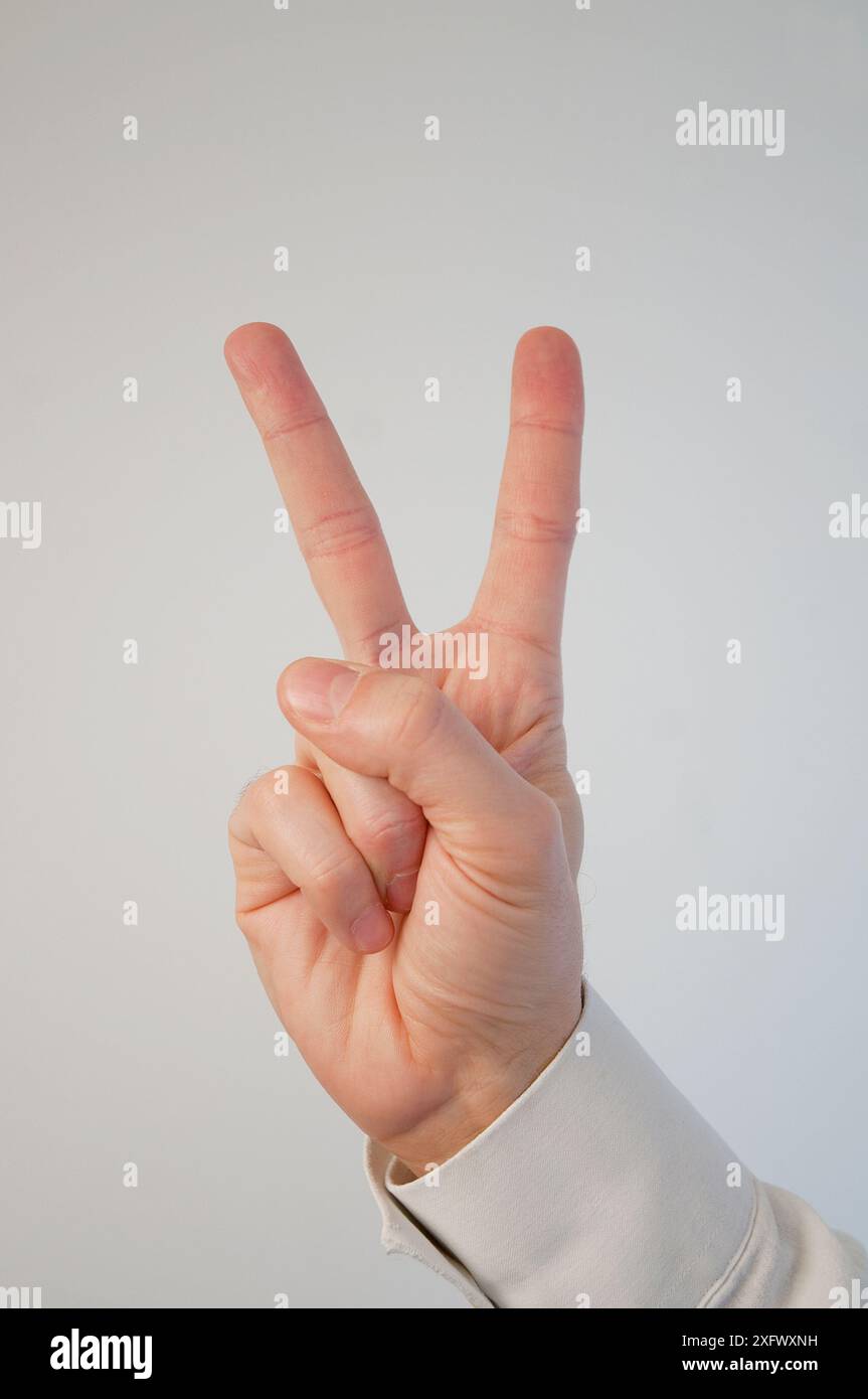 Symbols victory sign hand one hi-res stock photography and images - Alamy