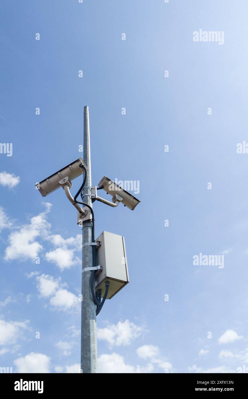 Twin Surveillance Cameras on Pole Stock Photo - Alamy