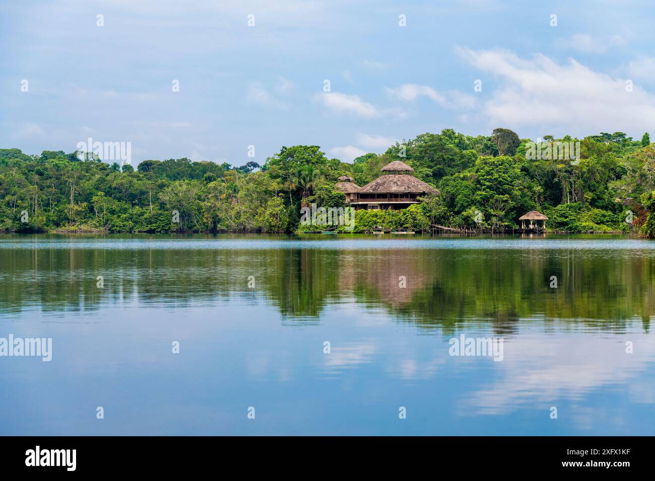 Amazon rainforest lodge reflection. Amazon river comprise the countries ...