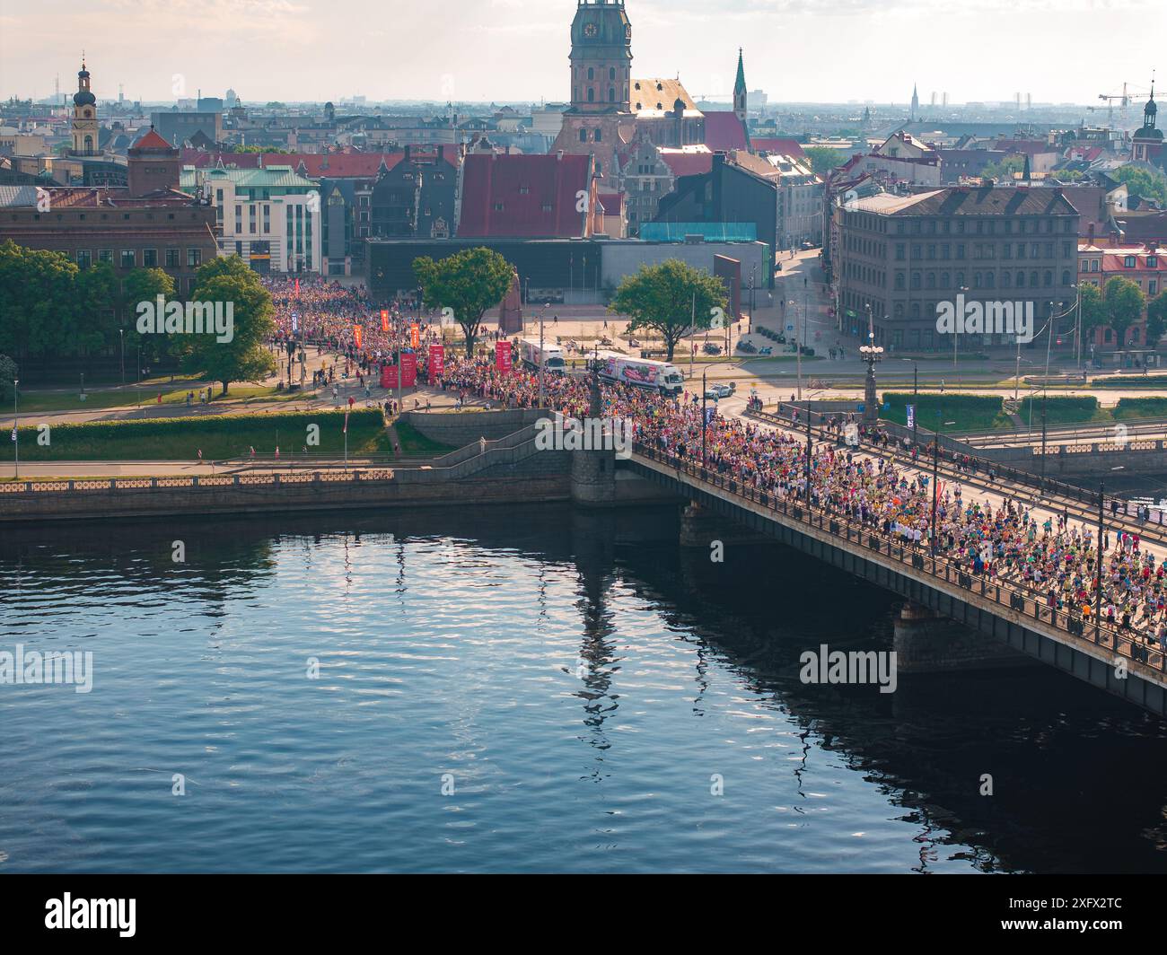 Aerial View of Marathon Runners Crossing a Bridge in Riga, Latvia Stock ...