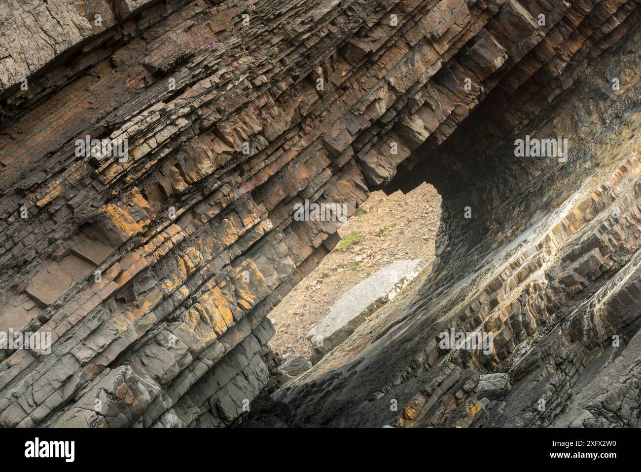 An eye hole eroded into dipping Carboniferous age Sandstones and Shales ...