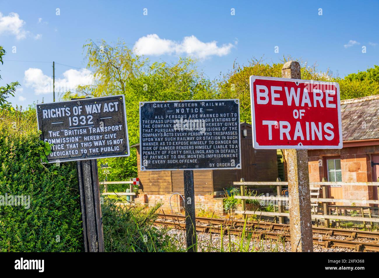 A collection of historic cast iron railway signs at the West Somerset ...
