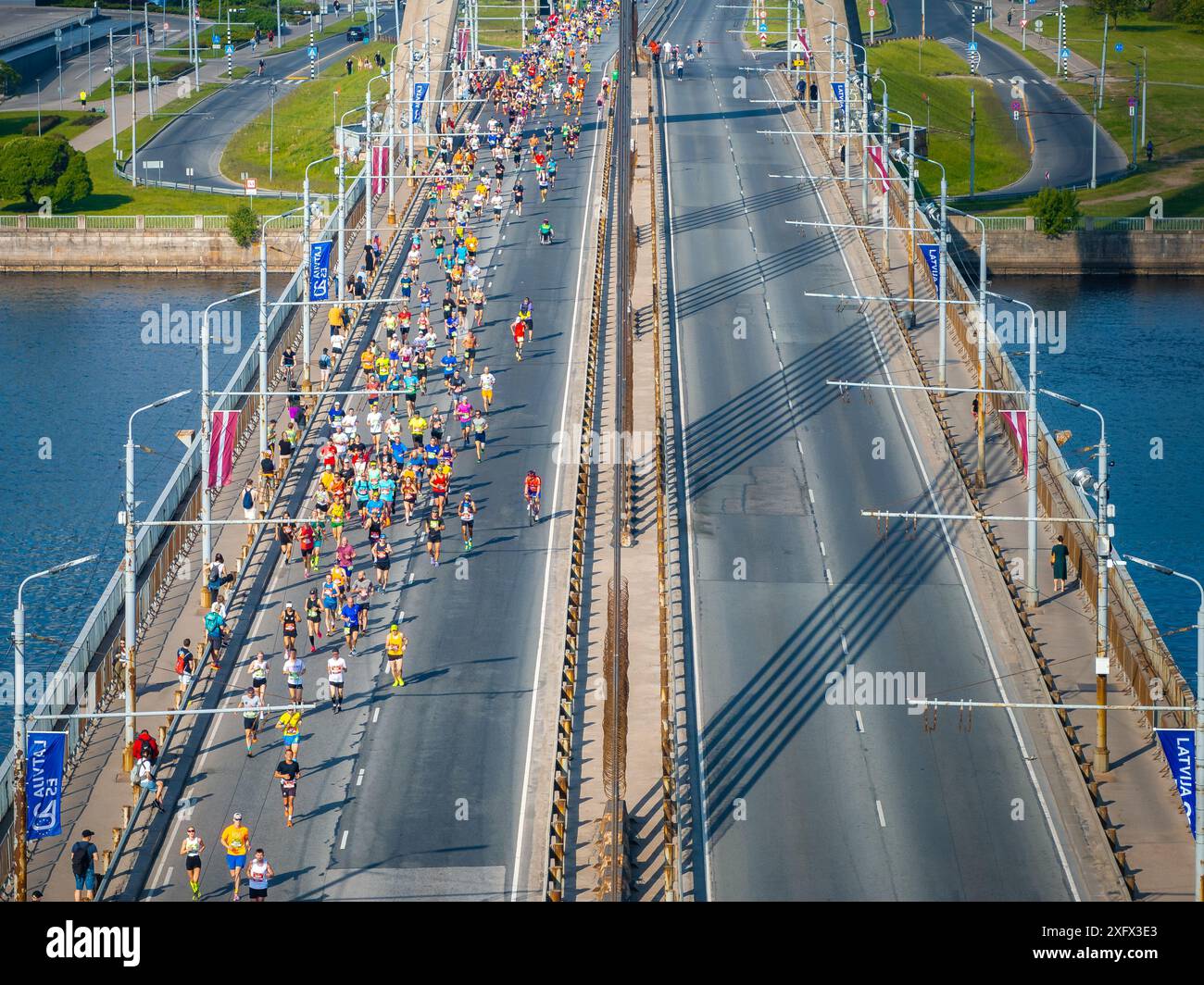 Aerial View of Marathon Runners on Bridge in Riga, Latvia with ...
