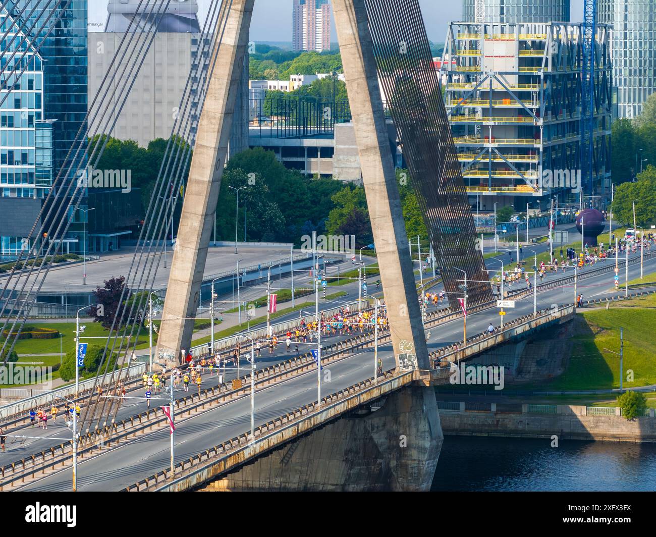 Aerial View of Marathon Runners on Cable-Stayed Bridge in Riga, Latvia ...