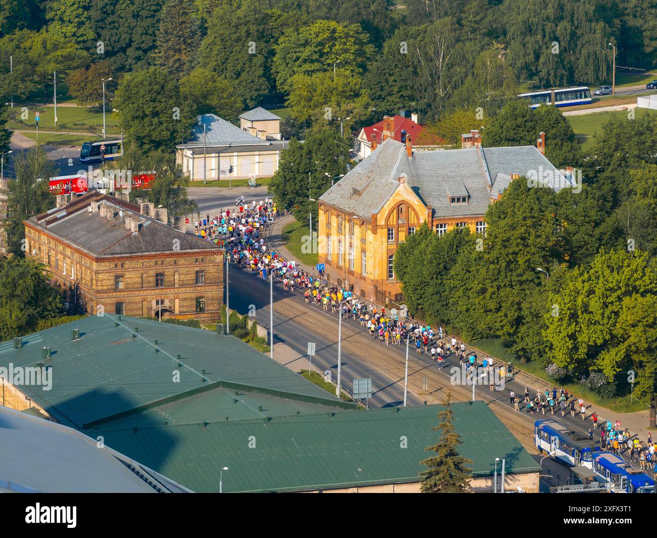 Aerial View of Marathon Runners in Riga, Latvia with Yellow Building ...
