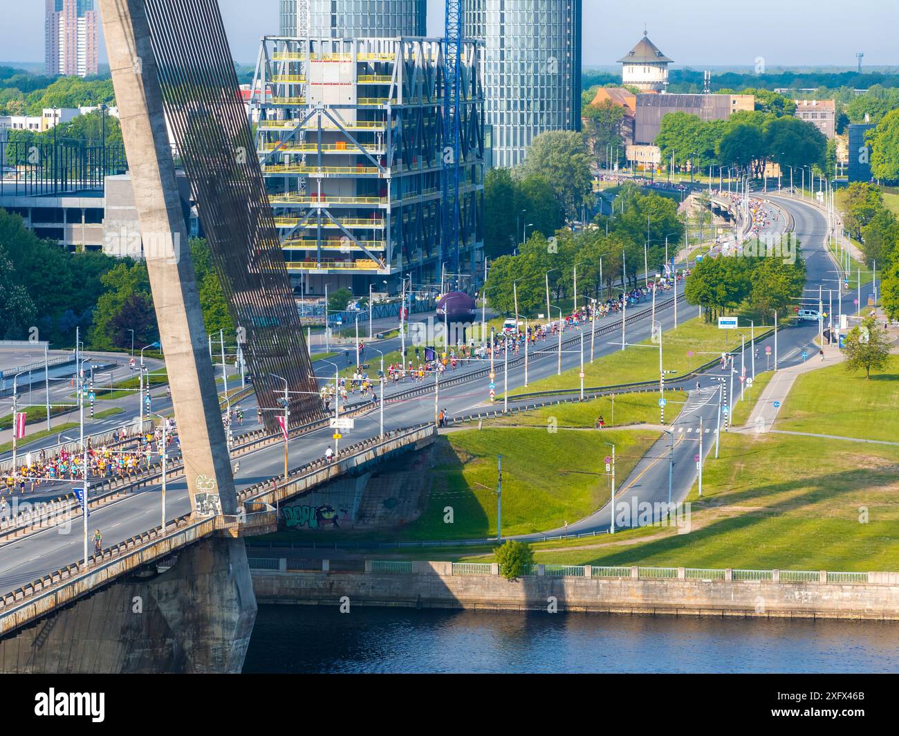 Aerial View of Marathon Runners on Cable-Stayed Bridge in Riga, Latvia ...