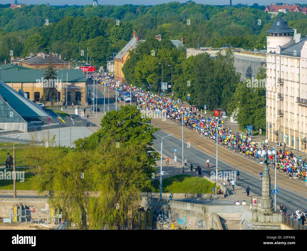 Aerial View of Marathon Runners in Riga, Latvia, Along Tree-Lined ...