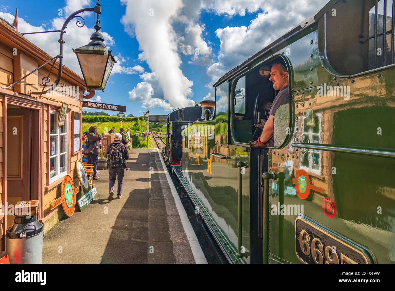Preserved ex-GWR steam locos 6695 & 9466 arriving at Williton station ...