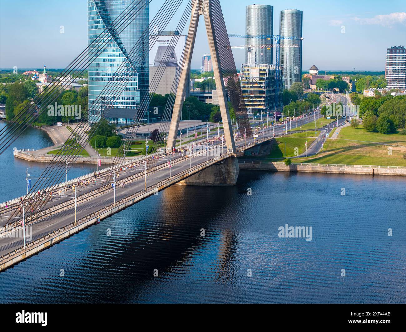 Aerial View of Marathon Runners on Cable-Stayed Bridge in Riga, Latvia ...
