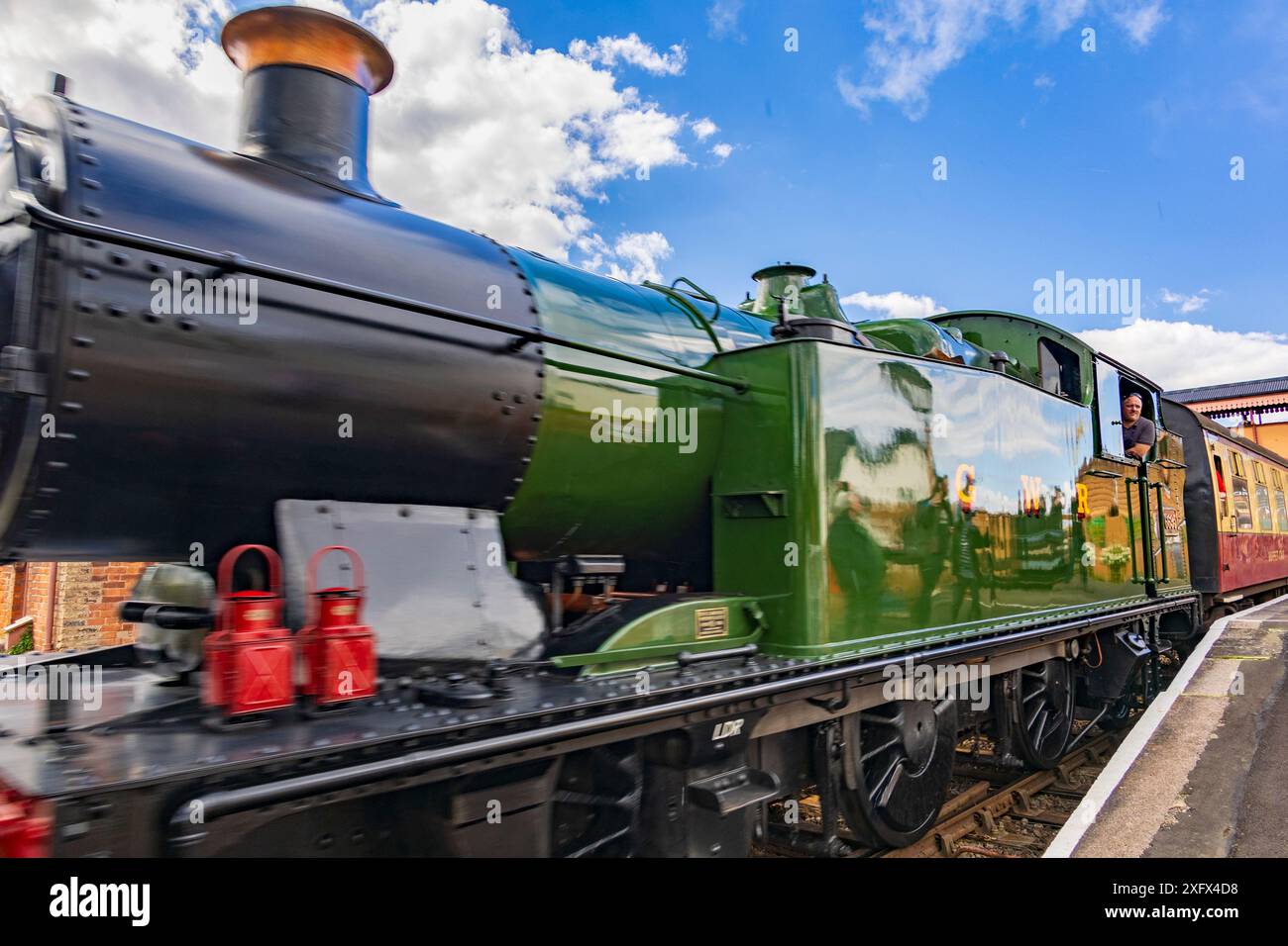 Preserved ex-GWR steam loco 6695 leaving Williton station with a ...
