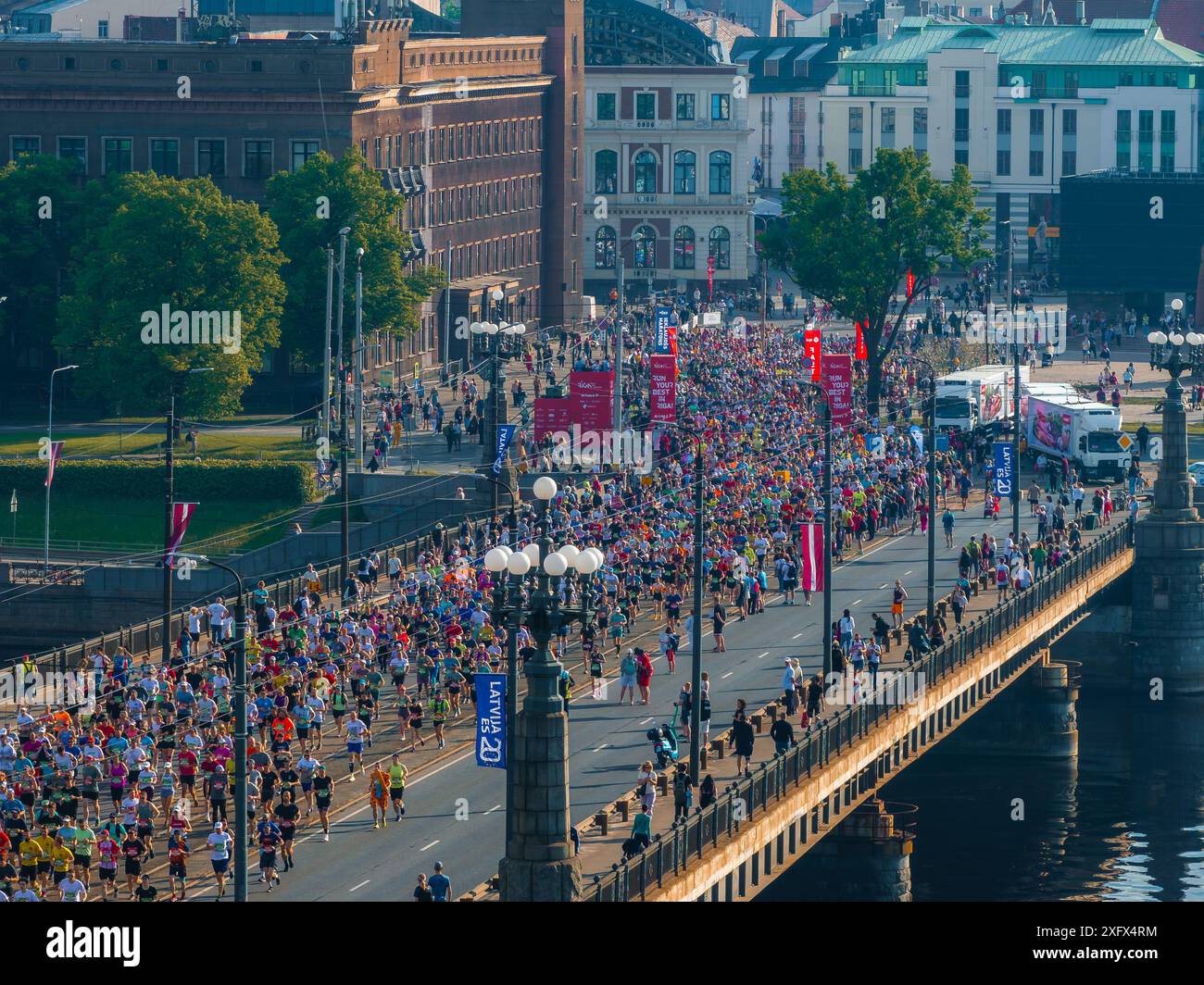 Aerial View of Marathon Runners Crossing Bridge in Riga, Latvia Stock ...