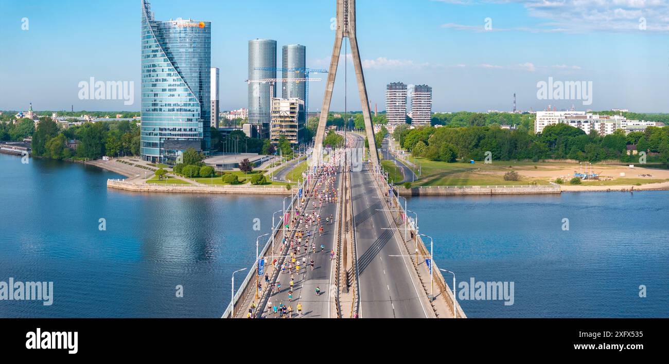 Aerial View of Marathon Runners on Cable-Stayed Bridge in Riga, Latvia ...