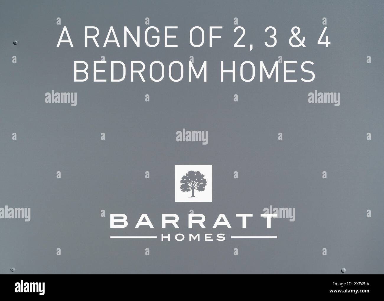 Close up of Barratt Homes sign board advertising a range of new build 2 ...