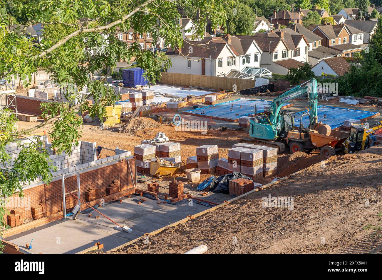 New build houses on a small build brownfield site partially finished ...