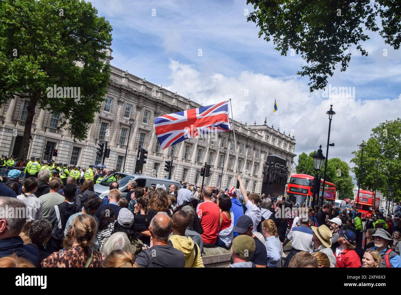 London, UK. 5th July 2024. Crowds of supporters and others gathered and ...