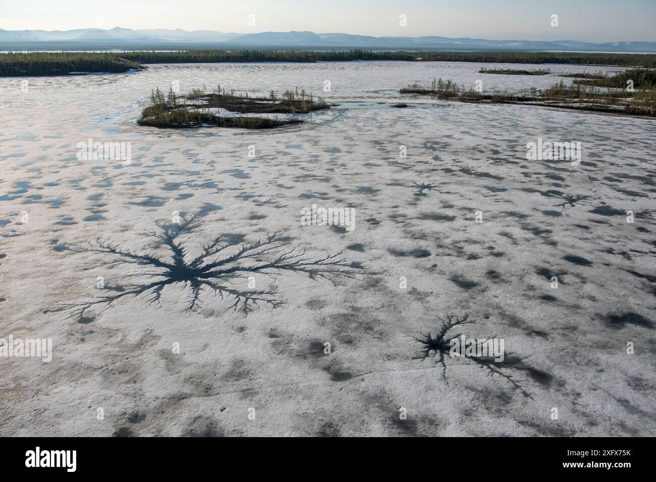 Aerial view melted ice around geothermal spring, Putoransky State ...