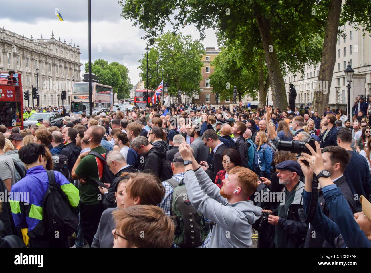 London, UK. 5th July 2024. Crowds of supporters and others gathered and ...