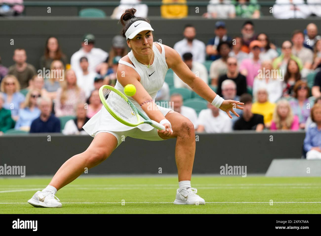 Bianca Andreescu of Canada plays a forehand return to Jasmine Paolini ...