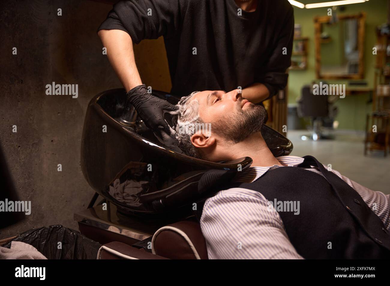 Closeup view barber using hair hi-res stock photography and images - Alamy