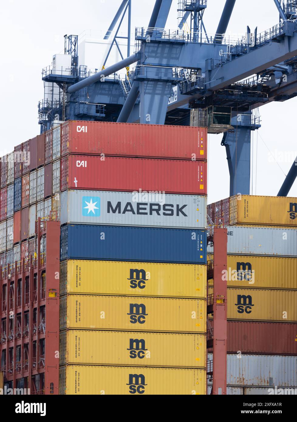 Stack of coloured shipping containers at the port of Felixstowe Suffolk ...