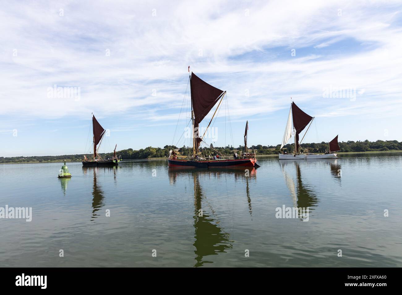 Thames sailing barges on a still calm River Orwell Suffolk England ...