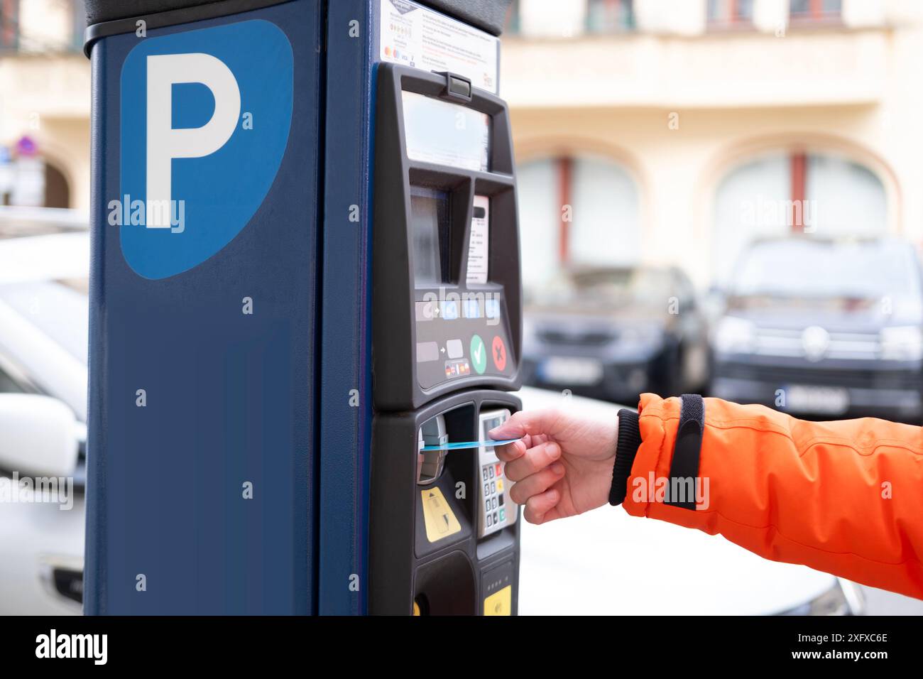 Driver paying for parking using an electronic street terminal ...