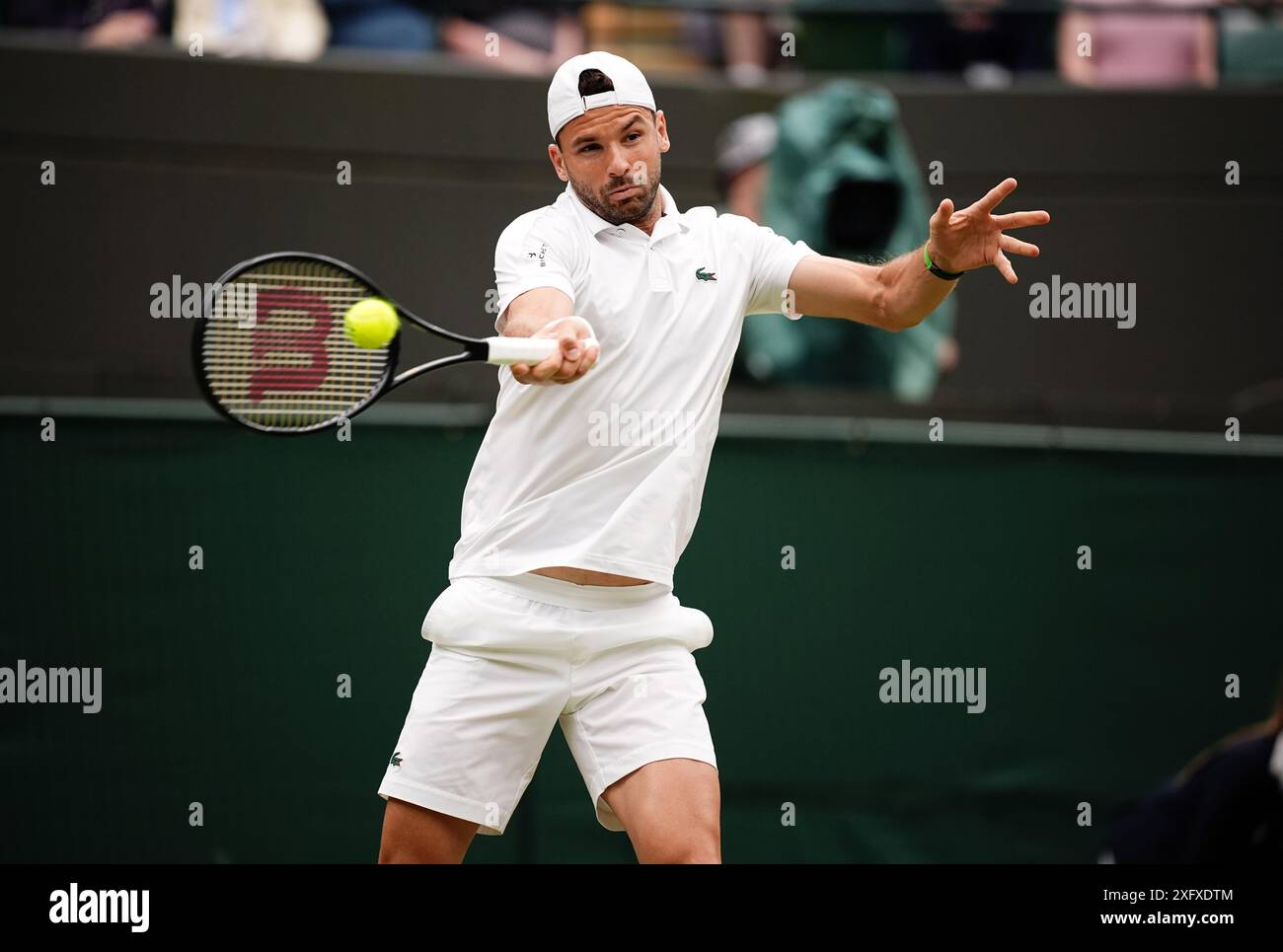 Grigor Dimitrov in action against Gael Monfils (not pictured) on day ...