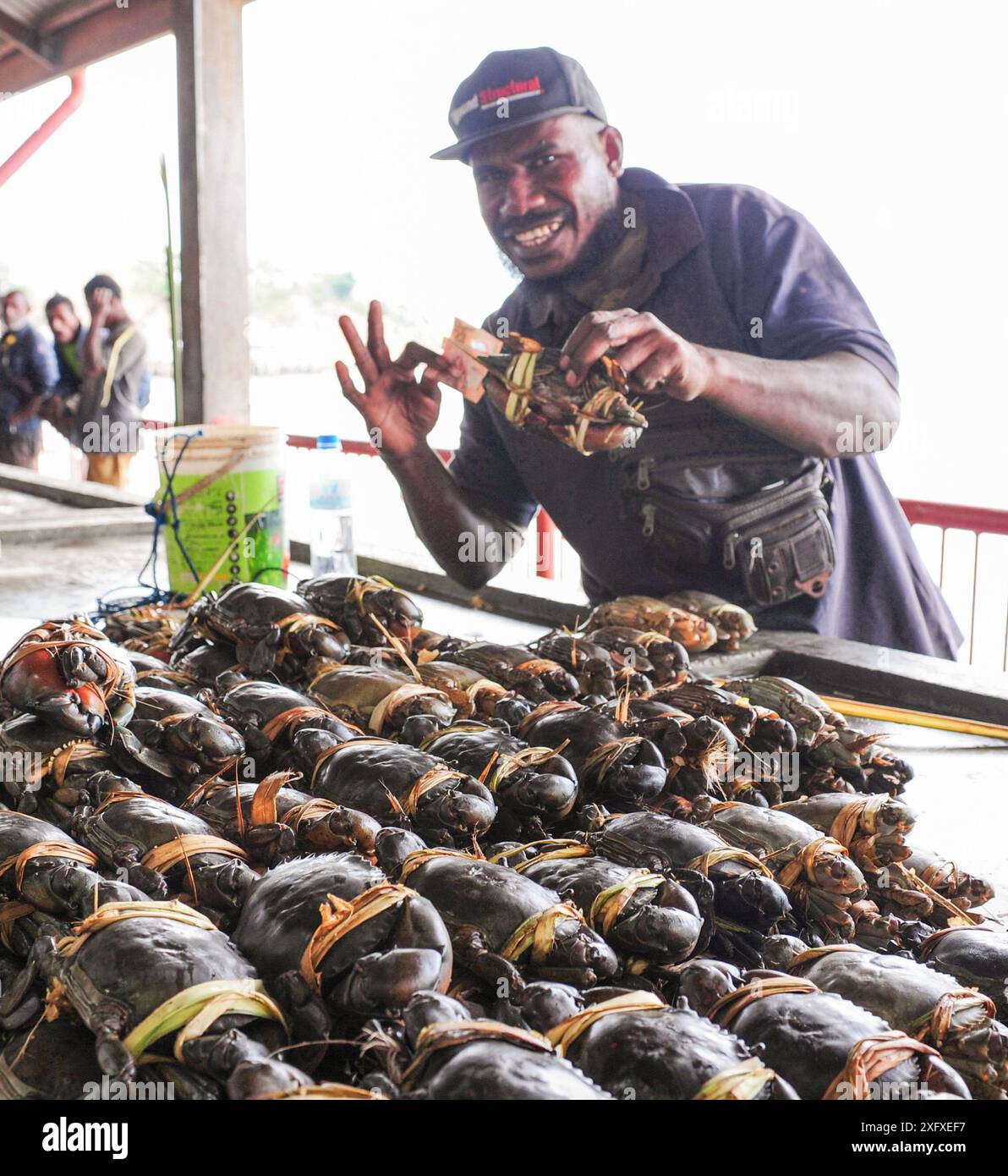 Port Moresby, Papua New Guinea. 5th July, 2024. A man sells crabs at ...