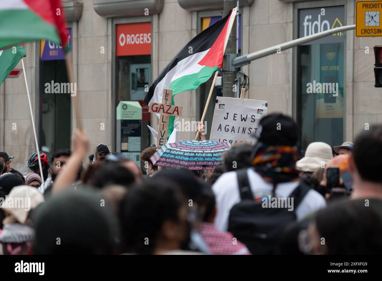 Protesters at the All Out For Gaza protest marching and protesting with ...