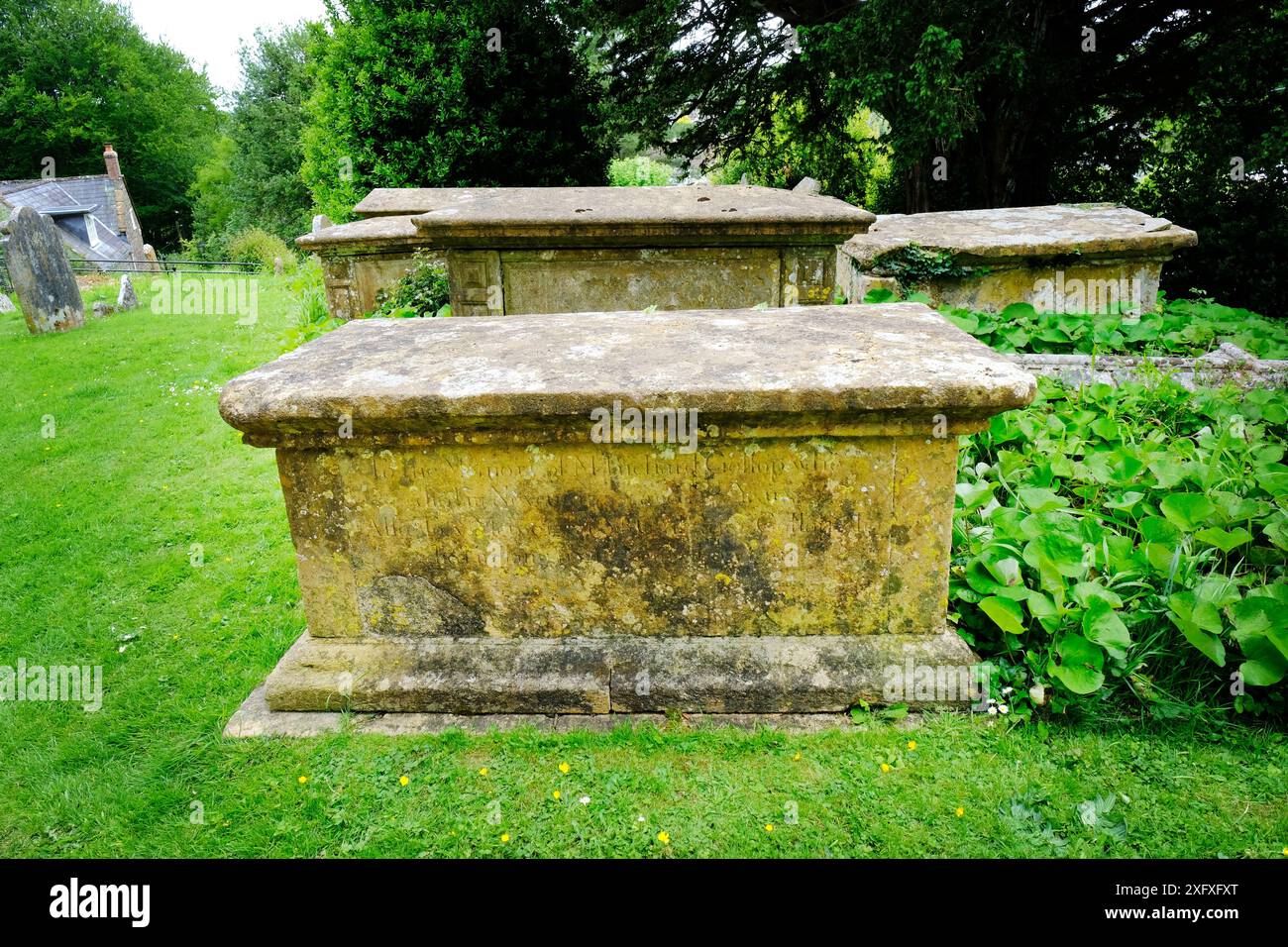 The churchyard of the parish church of St. Mary, Netherbury, Dorset, UK ...