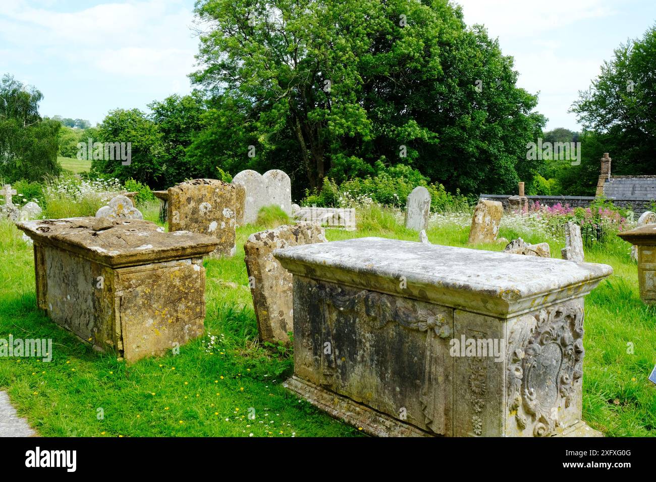 The churchyard of the parish church of St. Mary, Netherbury, Dorset, UK ...