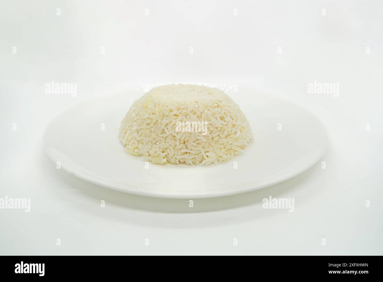 A Plate of White basmati long grain Rice isolated in White Background ...