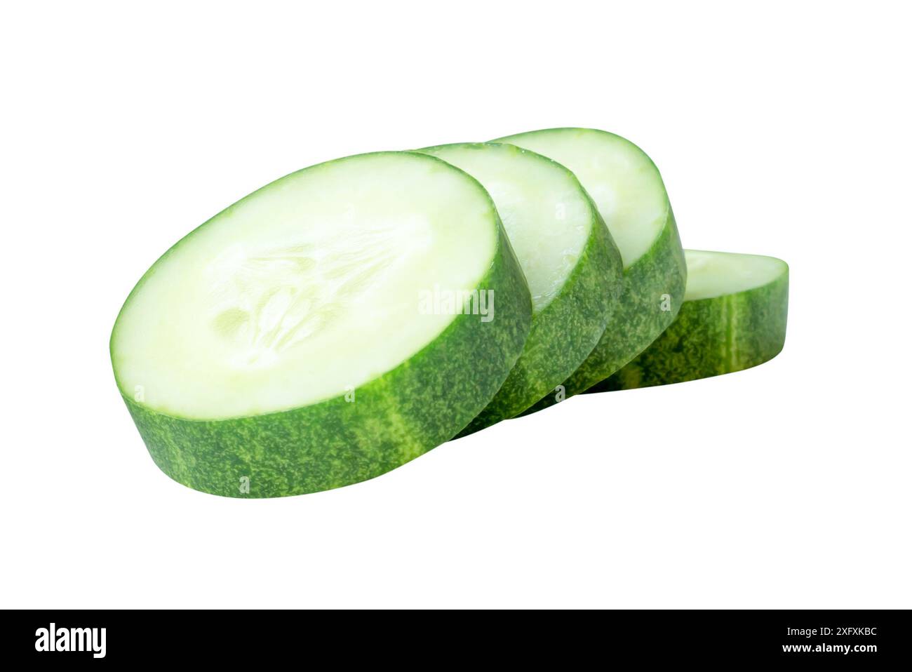 Front view of green cucumber slices or pieces in stack is isolated on ...