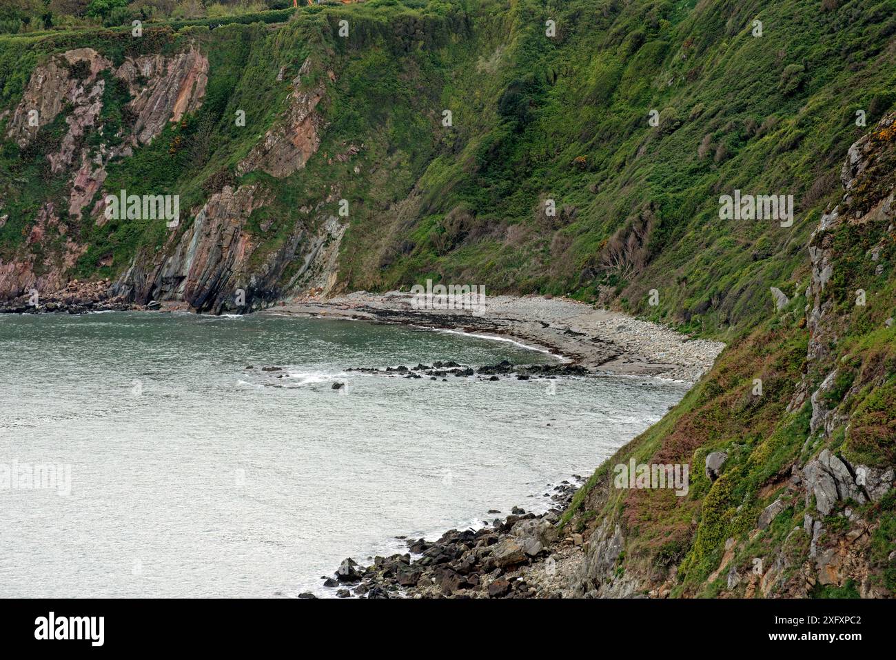 Cliff view and Doldrum Beach in Howth peninsula, Dublin, Ireland Stock ...